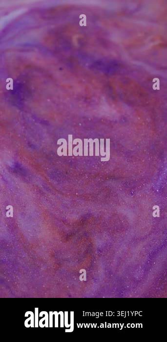 Vertical video. Paint liquid. Acrylic pigment. Defocused purple orange ...