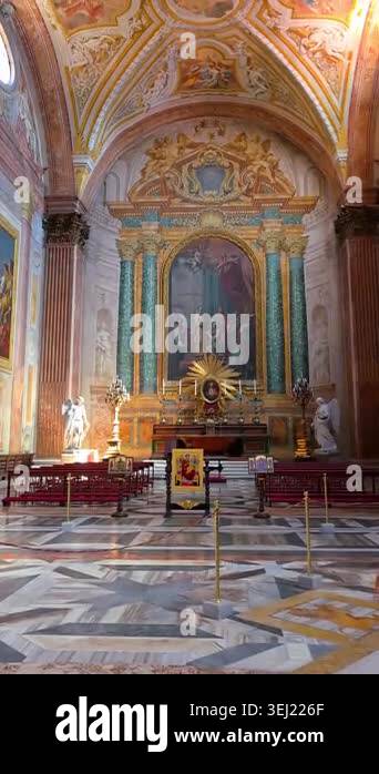 Interior view of a historic roman basilica with massive marble columns ...