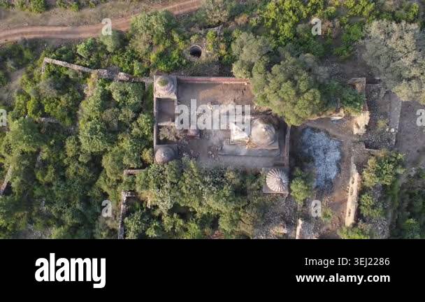 Tilla jogian pakistan aerial tilt down view of historic temple compound ...