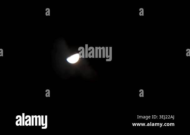 time lapse view of the moon in a cloudy sky at night Stock Video ...