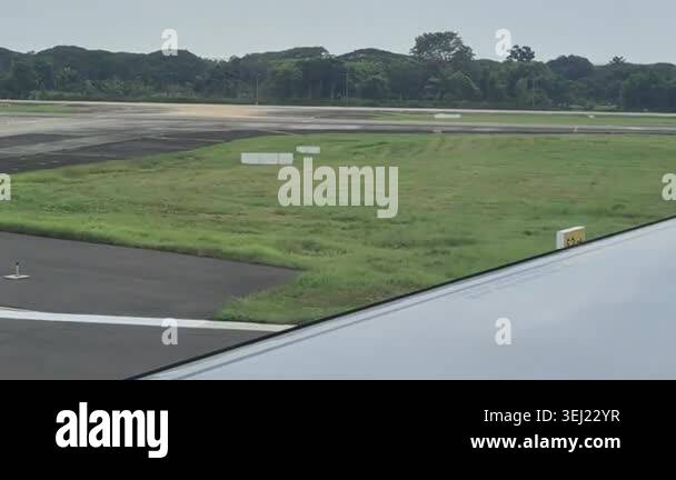 airplane wing on the runway Stock Video Footage - Alamy