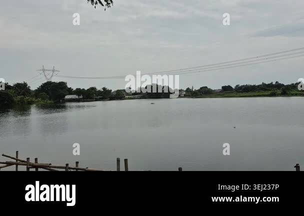 beautiful landscape with a lake and a cloudy sky Stock Video Footage ...
