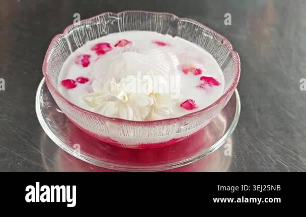 Gourmet water chestnut rubies in sweet coconut milk decorated with ...