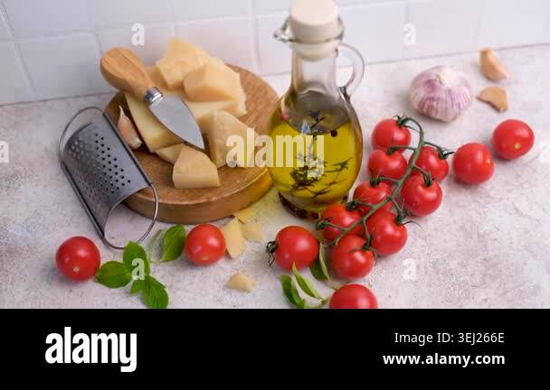 Still life with traditional italian food ingredients like parmesan ...
