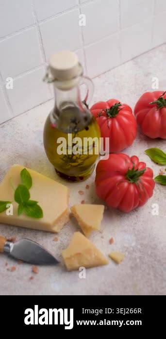 Still life with traditional italian food ingredients like parmesan ...