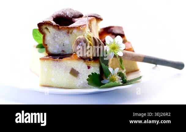 Delicious homemade casserole dessert on white background Stock Video ...