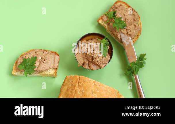 Homemade liver pate sandwiches with parsley on green background Stock ...