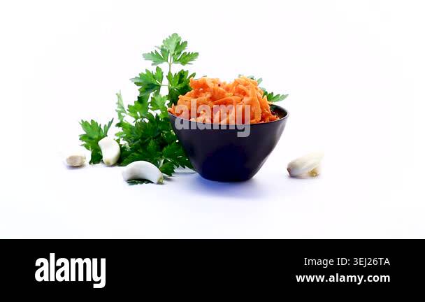 Fresh carrot appetizer with garlic and green parsley Stock Video ...