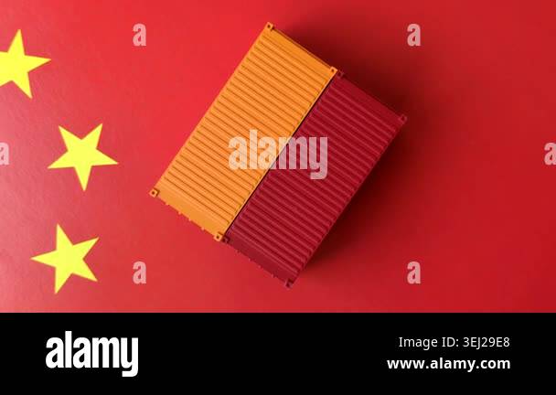 Cargo container on the china flag as a conceptual backdrop for goods ...