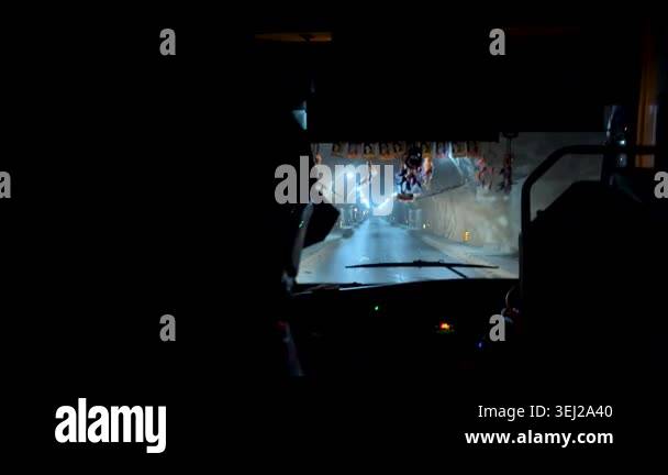 night bus journey through illuminated road tunnel with passenger ...