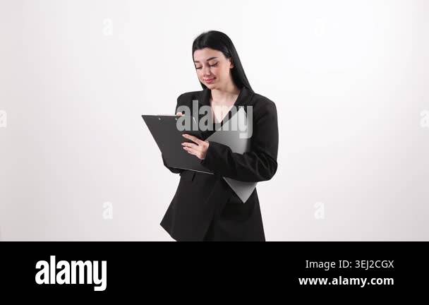 Smiling elegant female manager holding folder and checking documents ...