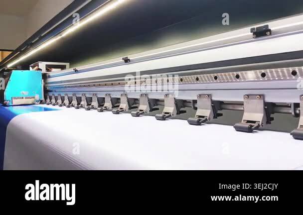 Large format digital printing machine in operation, Industrial, moving ...