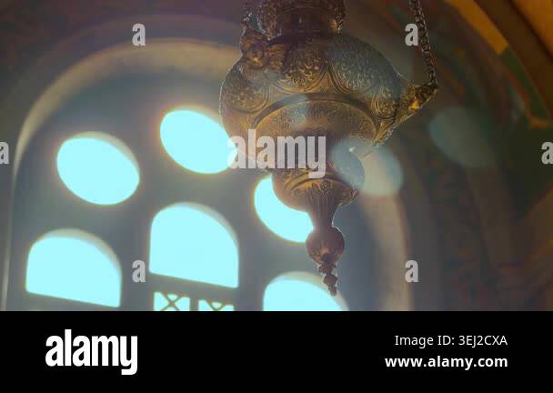 Ornate brass orthodox church oil lamp with cherub angel relief and ...