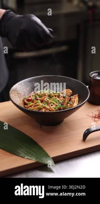 The chef is preparing dish in the kitchen. Japanese cuisine Stock Video ...