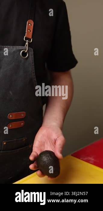 A professional chef prepares delicious fresh breakfast dishes in a ...