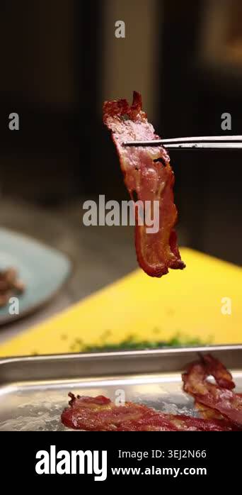 A professional chef prepares delicious fresh breakfast dishes in a ...