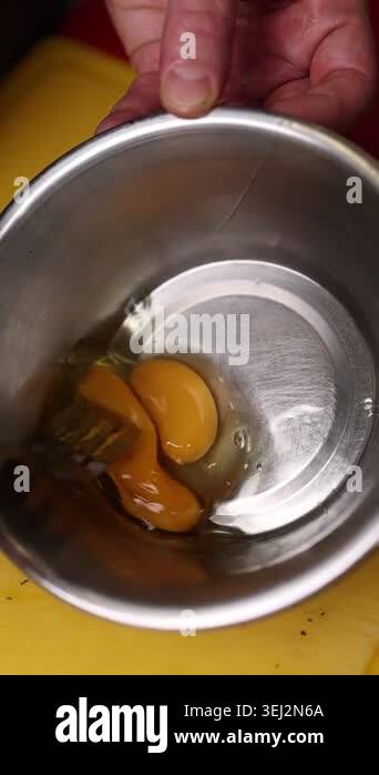 A professional chef prepares delicious fresh breakfast dishes in a ...