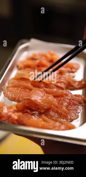 A professional chef prepares delicious fresh breakfast dishes in a ...