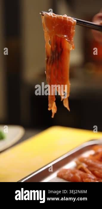 A professional chef prepares delicious fresh breakfast dishes in a ...