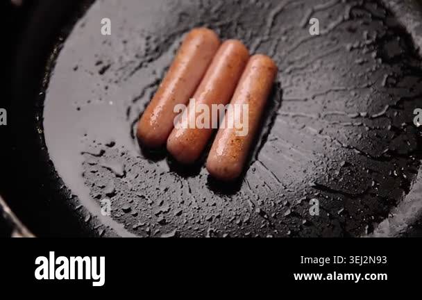 A professional chef prepares delicious fresh breakfast dishes in a ...