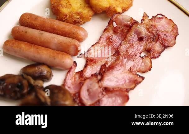 A professional chef prepares delicious fresh breakfast dishes in a ...