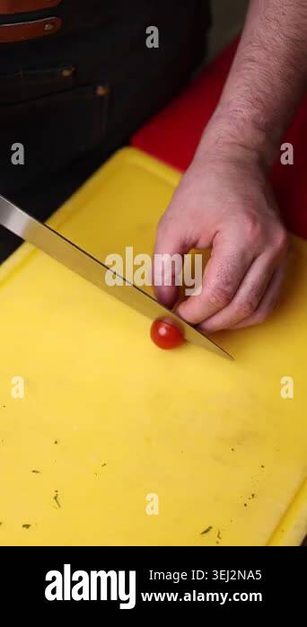 A professional chef prepares delicious fresh breakfast dishes in a ...