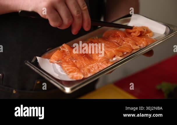 A professional chef prepares delicious fresh breakfast dishes in a ...