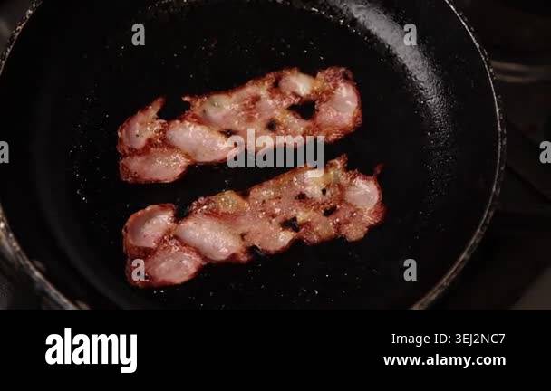 A professional chef prepares delicious fresh breakfast dishes in a ...