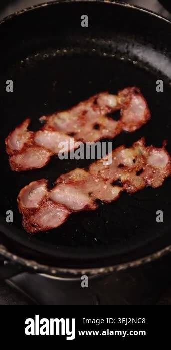 A professional chef prepares delicious fresh breakfast dishes in a ...
