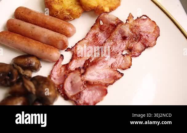 A professional chef prepares delicious fresh breakfast dishes in a ...