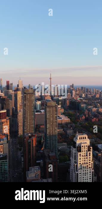 Unique aerial perspective of golden hour illuminating Torontos skyline ...