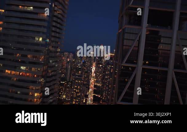 Aerial oblique angle shot of nighttime Toronto cityscape with modern ...