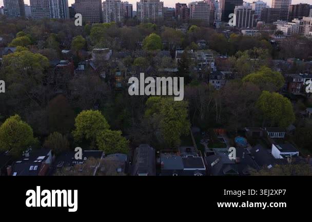 Urban homes nestled within Torontos vibrant cityscape during spring ...