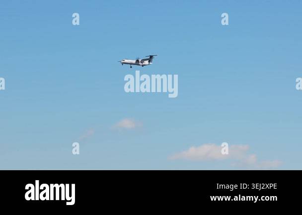 Commercial turboprop airplane landing in Toronto, showing an aircraft ...