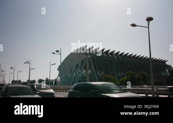 Urban traffic moving across the assut de lor bridge with the modern ...