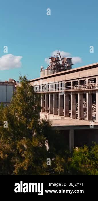 Aerial view of a large, derelict industrial building with decaying ...