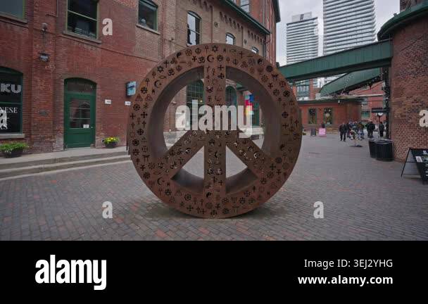 Peace sign sculpture promoting interfaith harmony and religious ...