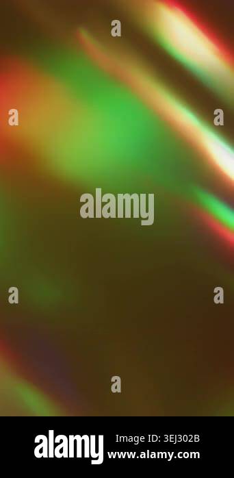 Vertical video. Rainbow flare defocused. Spectrum glow. Colorful rays ...