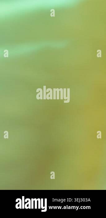 Vertical video. Blur glow. Flare texture. Green blue yellow reflection ...