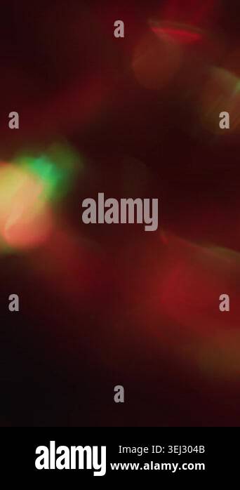 Vertical video. Gradient bokeh reflection. Shimmering glow. Red green ...