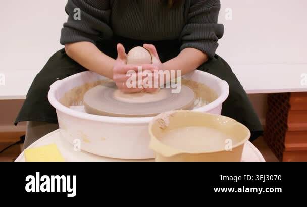 Pottery craft. Handmade occupation. Unrecognizable professional female ...