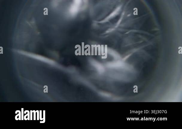 Defocused haze mix. Ink blob. Dark color dye dissolving underwater ...