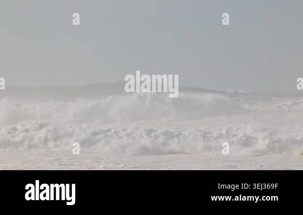 Big waves crushing in winter season in Nazare, Portugal Stock Video ...