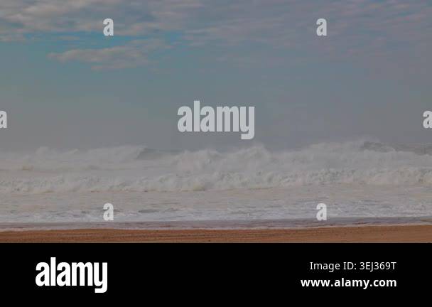 Big waves crushing in winter season in Nazare, Portugal Stock Video ...