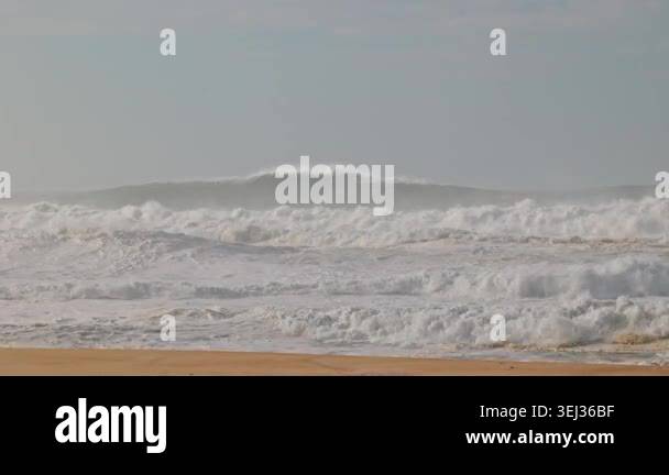 Big waves crushing in winter season in Nazare, Portugal Stock Video ...