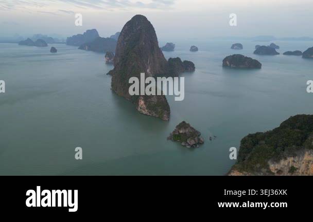 Aerial panorama of the limestone karst islands of Phang Nga Bay, flying ...