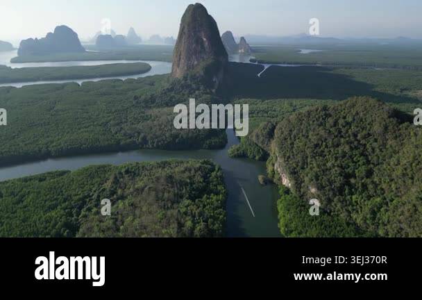 Aerial footage flying over the iconic limestone karsts and lush green ...