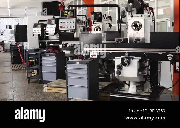 Modern milling machines in a technical workshop for metalworking and ...