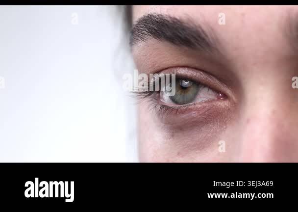 4K video macro closeup of young woman slowly opening and closing her ...