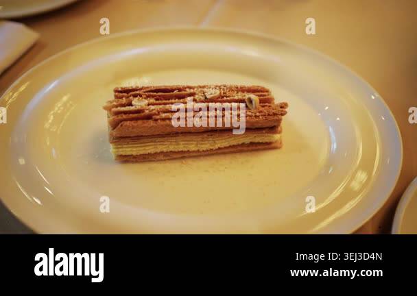 Elegant rectangular mille feuille dessert with layers of crispy puff ...